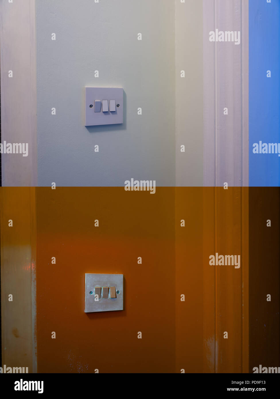 Seemingly clean light switch and wall is shown to be coated in body ...
