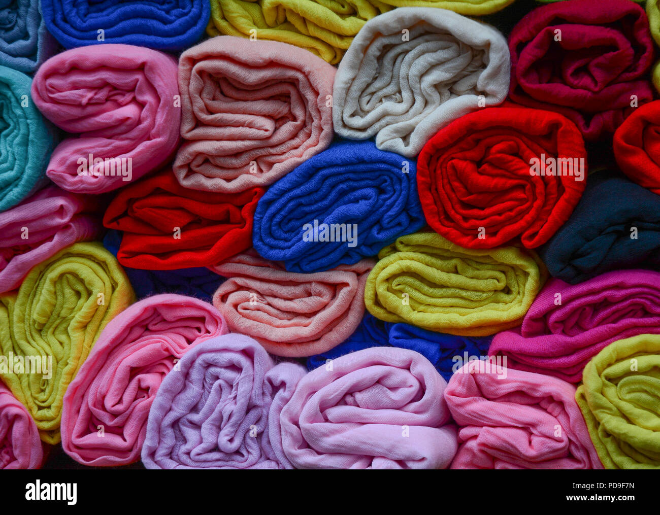 Colorful textile for sale at a street market in Fenghuang Town, China ...