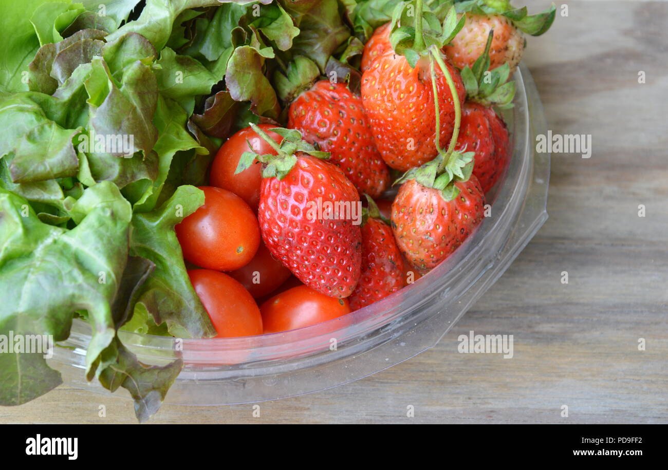 strawberry and cherry tomato with vegetable on plastic tray Stock Photo ...