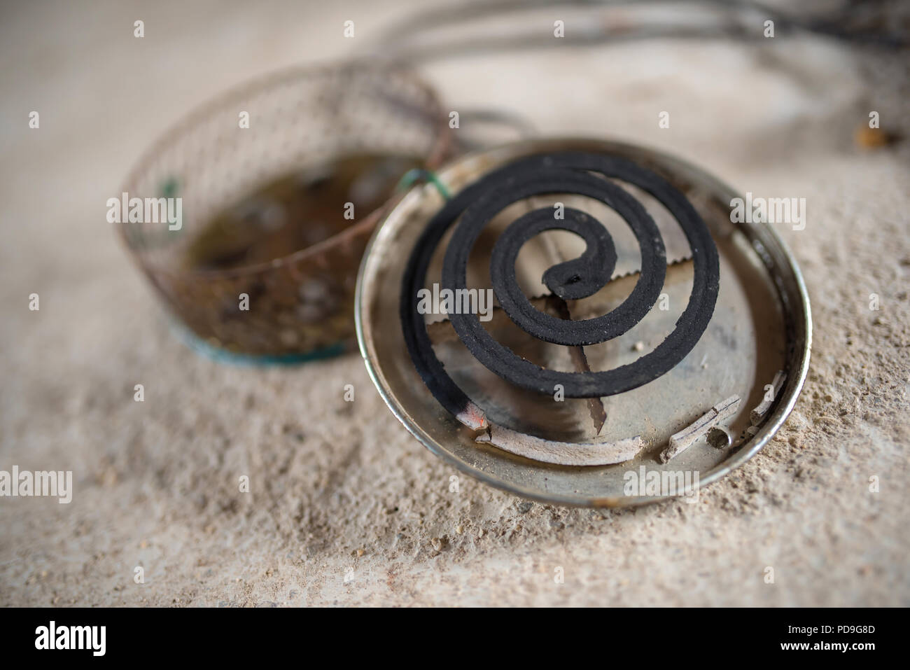 The burning type of mosquito-repellent during burning Stock Photo - Alamy