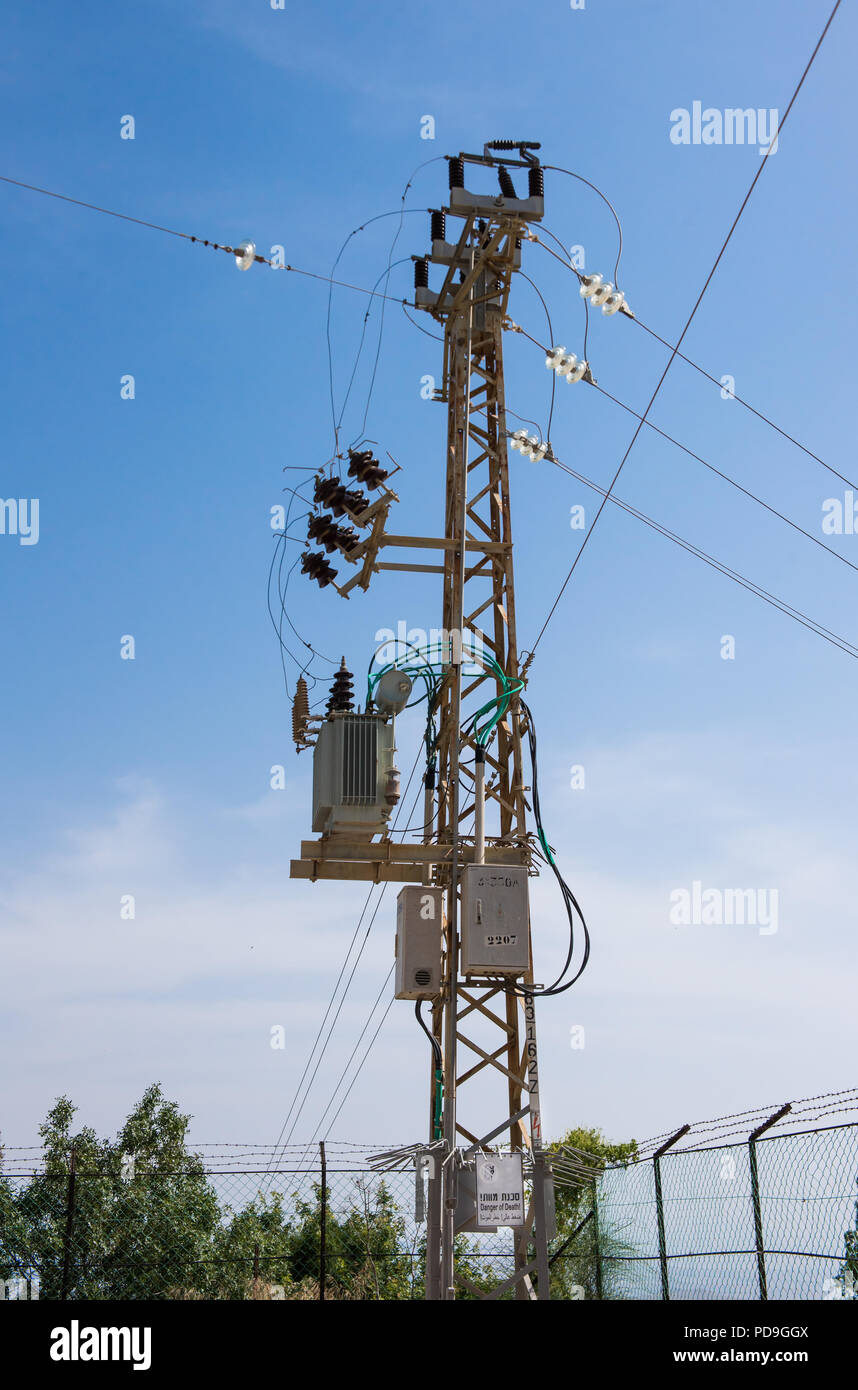 Transformer posts are often seen in Israel with the transformer on the ...
