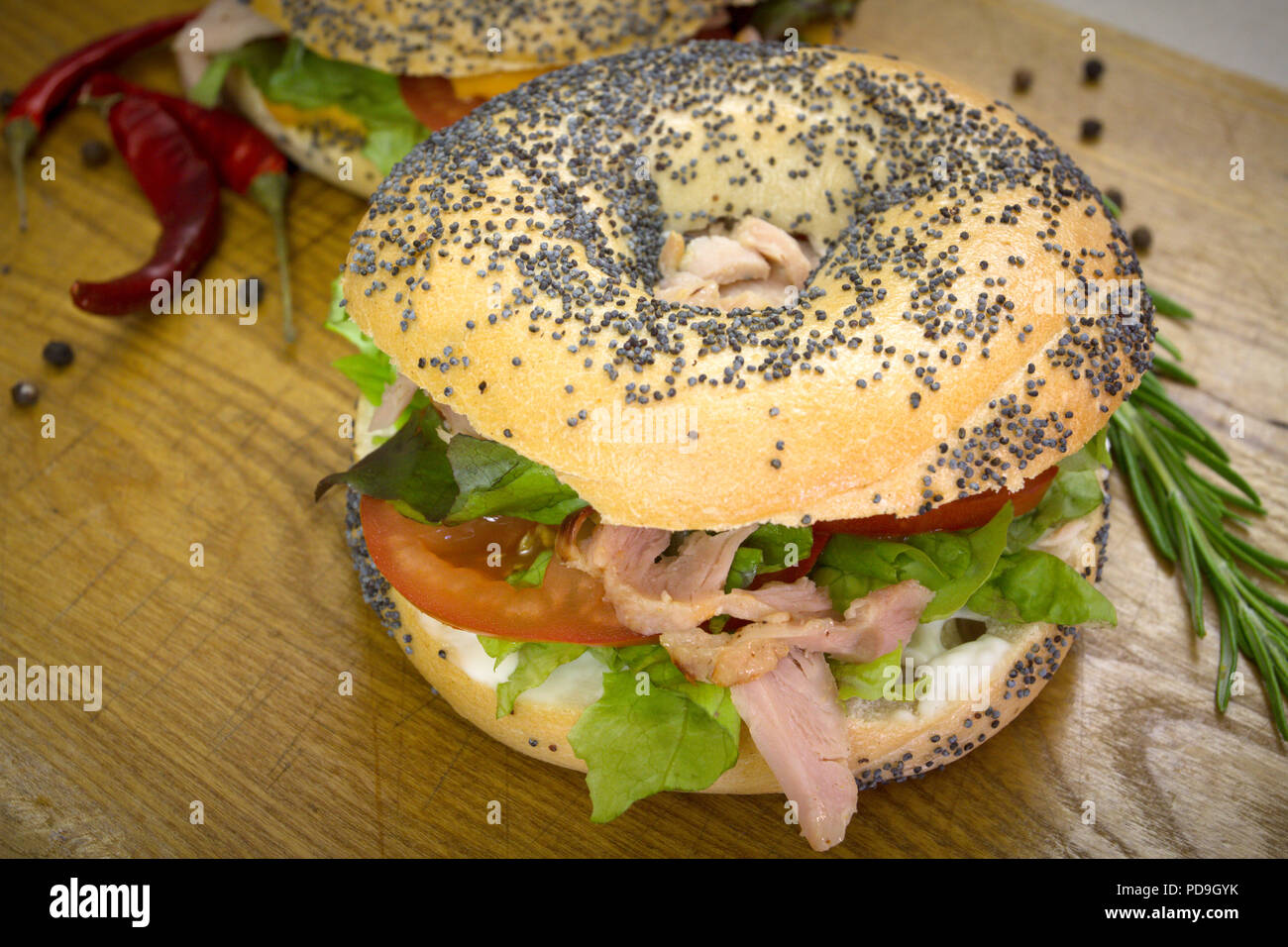 chicken and raw bagel sandwich Stock Photo - Alamy