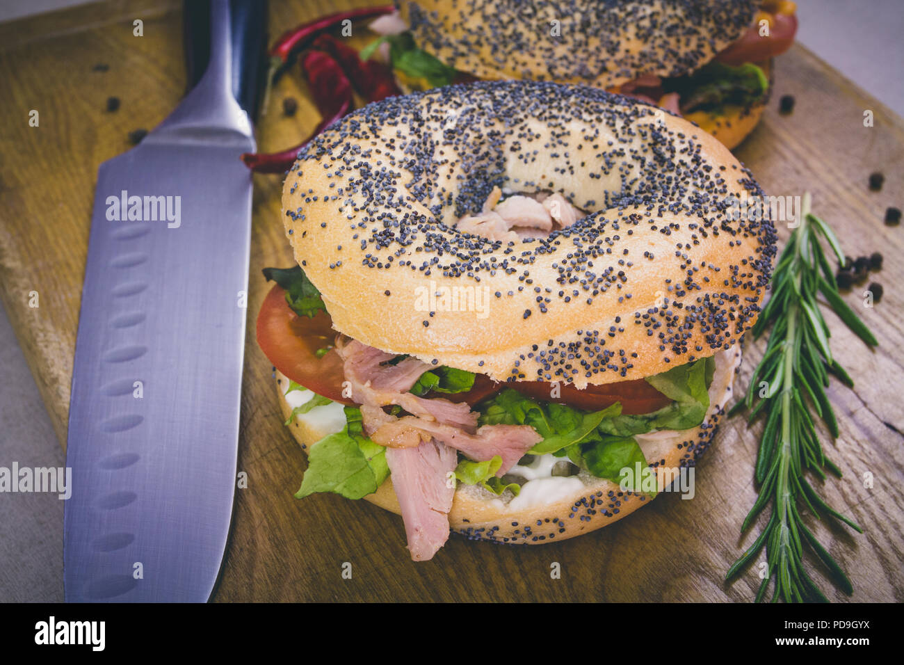 chicken and raw bagel sandwich Stock Photo - Alamy