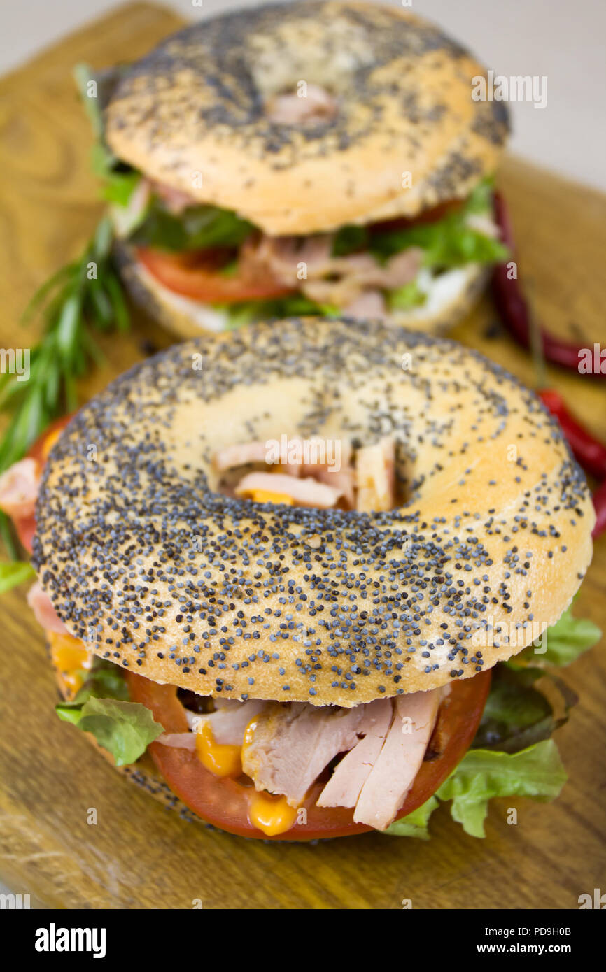 chicken and raw bagel sandwich Stock Photo - Alamy