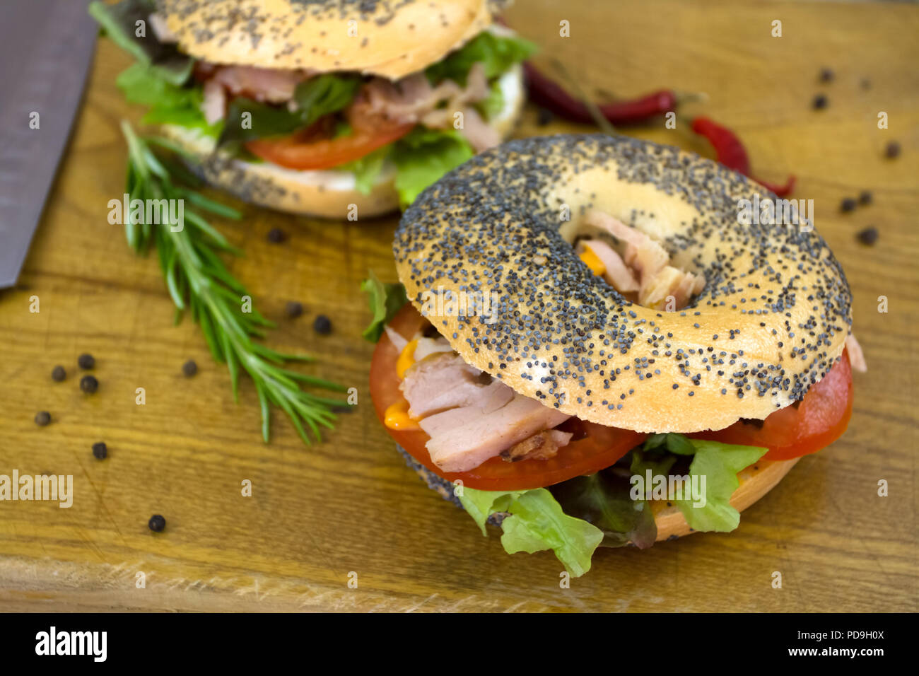chicken and raw bagel sandwich Stock Photo - Alamy