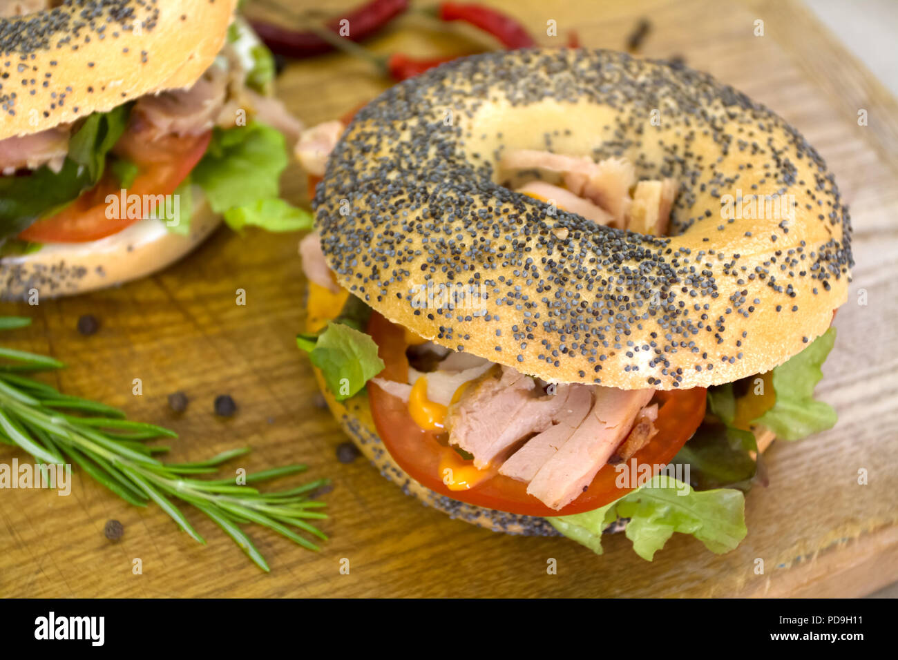 chicken and raw bagel sandwich Stock Photo - Alamy