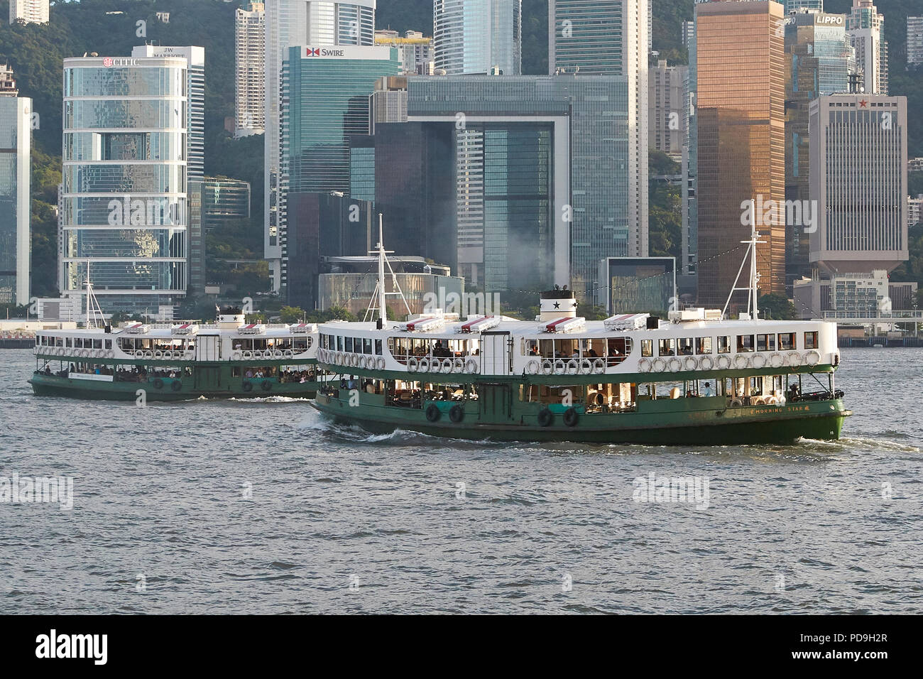Two Historic Star Ferry Boats Crossing Victoria Harbour. The Hong Kong ...