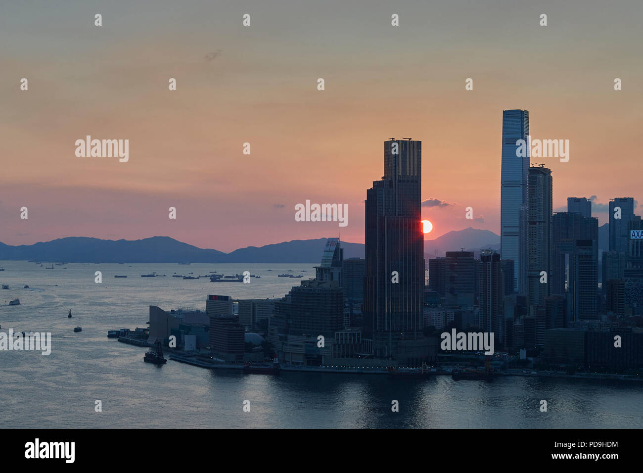 Sunset Over Victoria Harbour Hong Kong And The Tsim Sha Tsui Skyline ...
