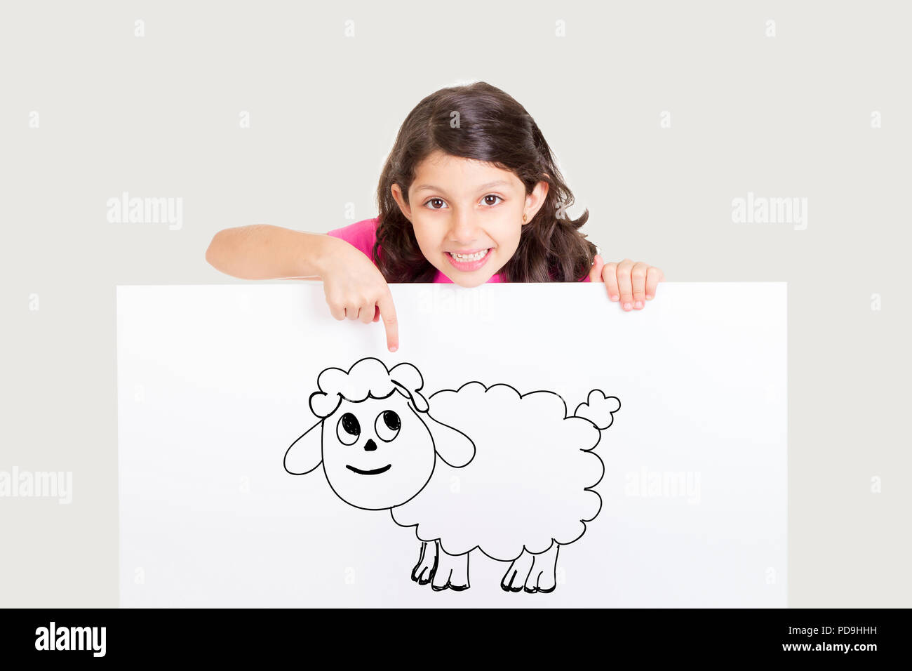 Cute girl showing white board with drawing of sheep - celebrating Eid ...