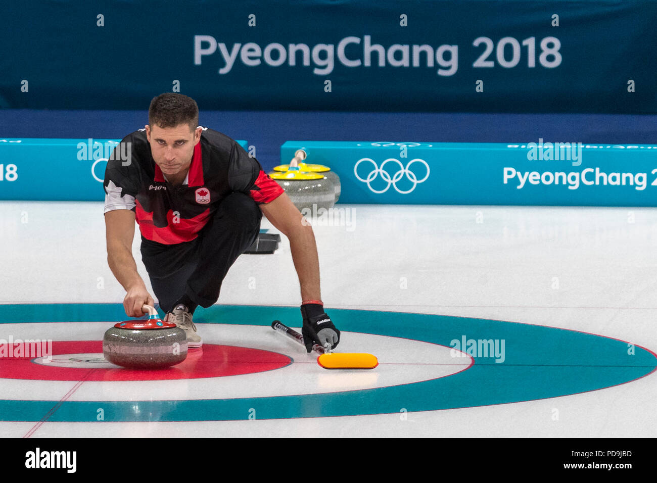 John Morris (CAN) competing in the Mixed Doubles Curling round robin at ...