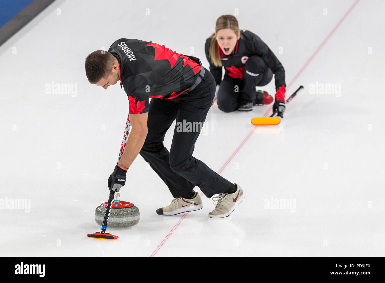 John Morris and Kaitlyn Lawes (CAN) competing in the Mixed Doubles ...