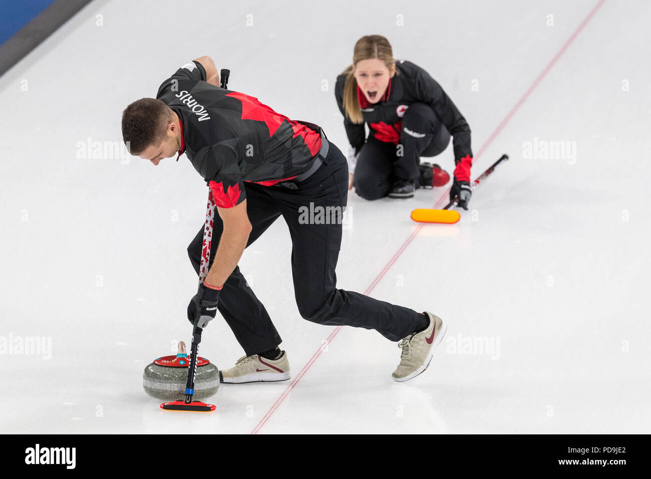John Morris and Kaitlyn Lawes (CAN) competing in the Mixed Doubles ...