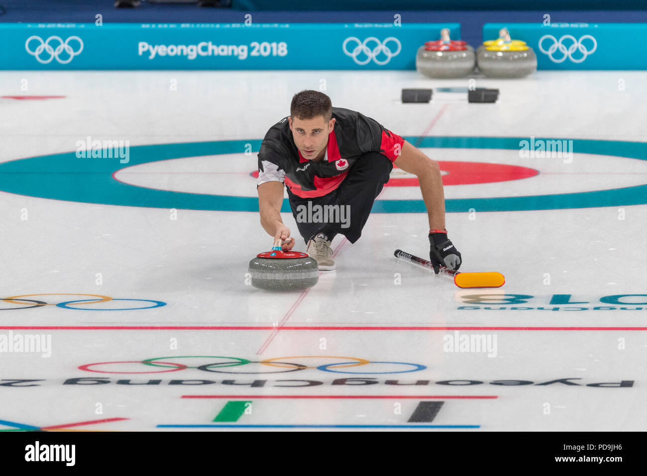 John Morris (CAN) competing in the Mixed Doubles Curling round robin at ...