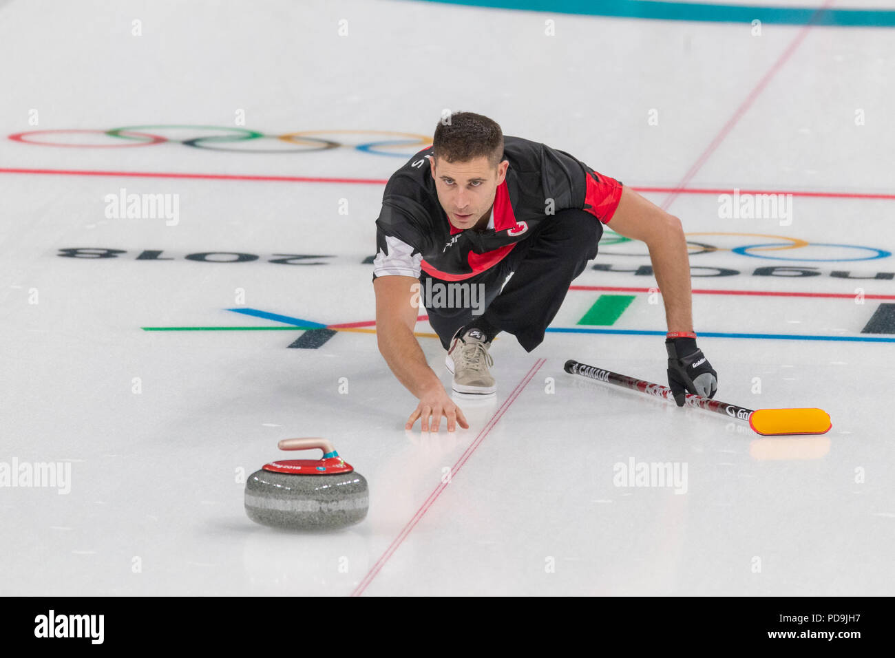 John Morris (CAN) competing in the Mixed Doubles Curling round robin at ...