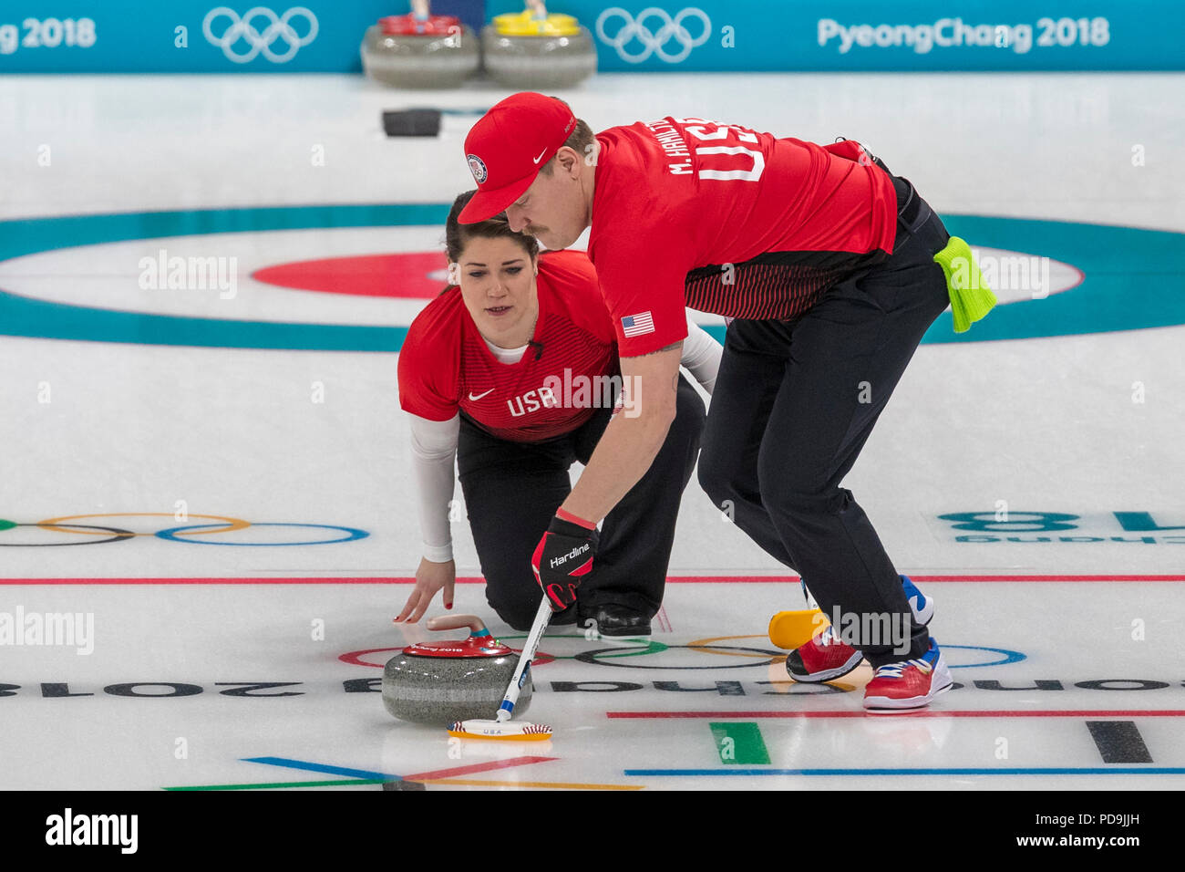 Matt and Rebecca Hamilton (USA) competing in the Mixed Doubles Curling ...