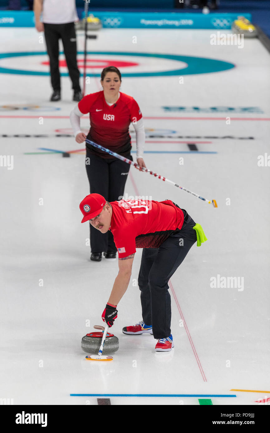 Matt and Rebecca Hamilton (USA) competing in the Mixed Doubles Curling ...