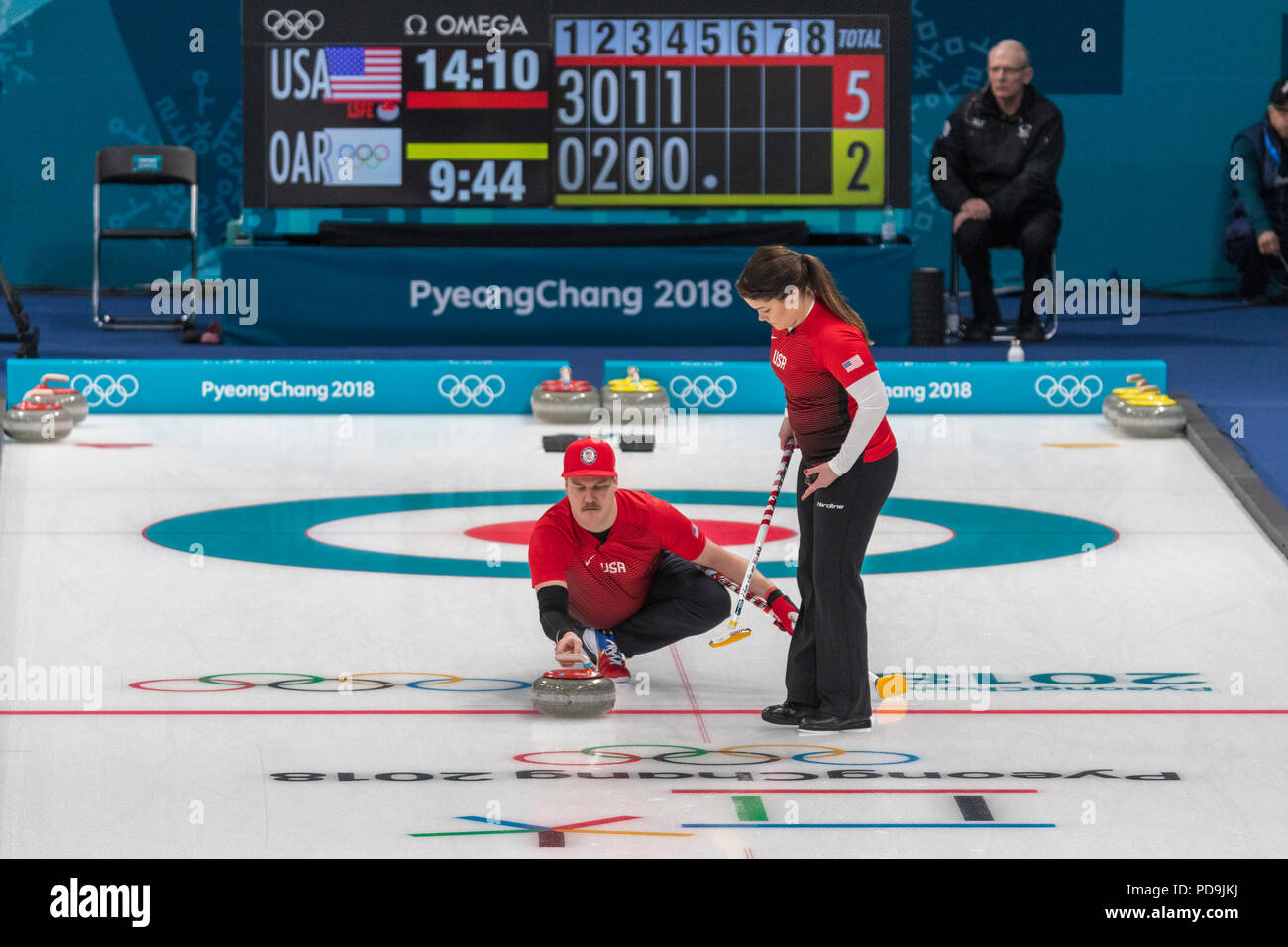 Matt and Rebecca Hamilton (USA) competing in the Mixed Doubles Curling ...