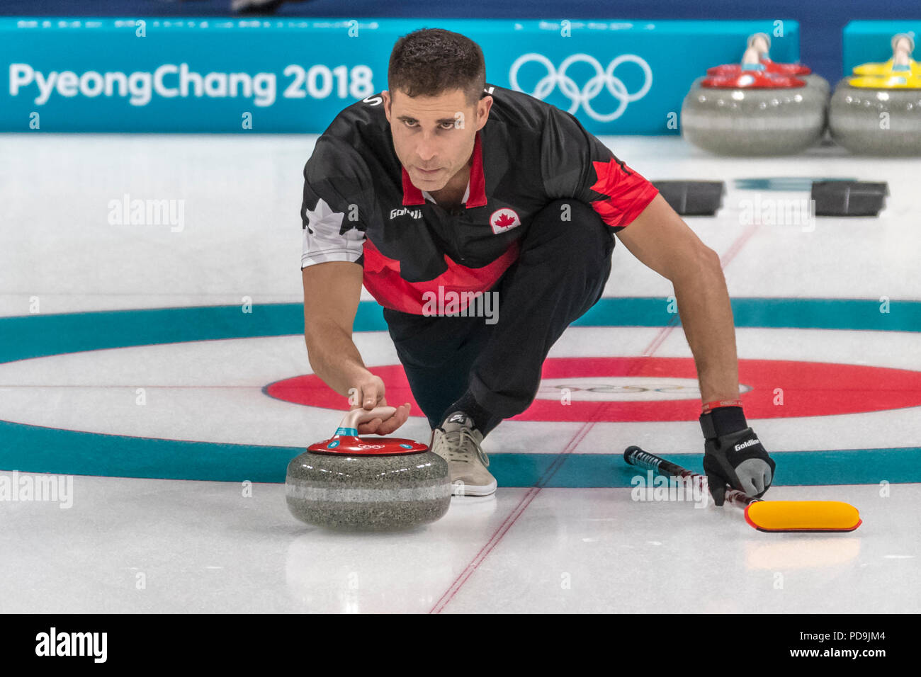 John Morris (CAN) competing in the Mixed Doubles Curling round robin at ...