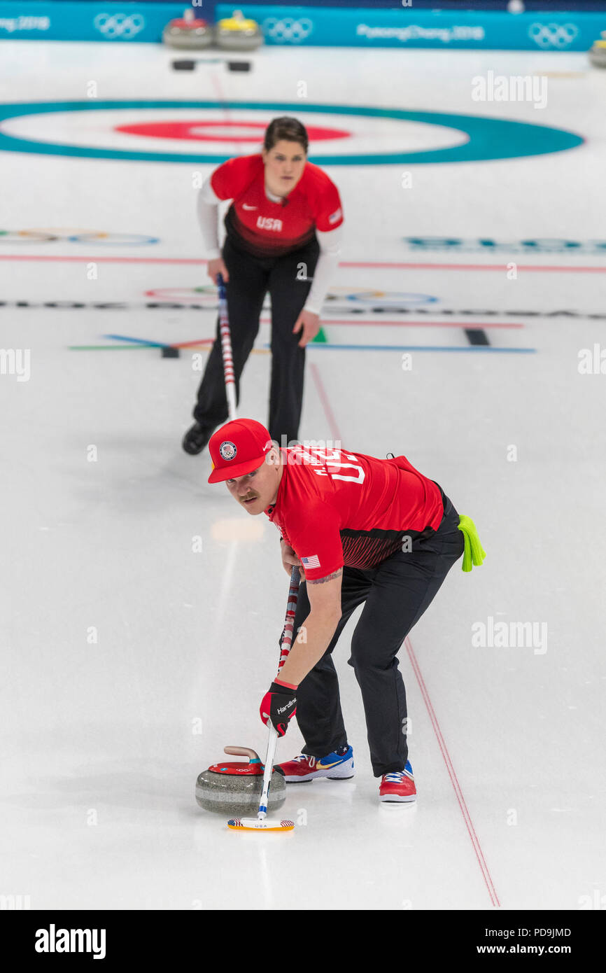 Matt and Rebecca Hamilton (USA) competing in the Mixed Doubles Curling ...