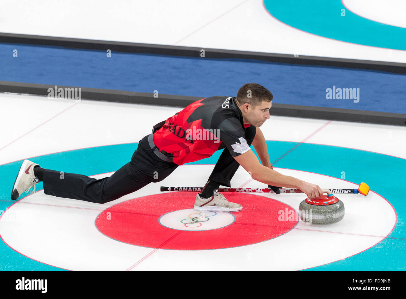 John Morris (CAN) competing in the Mixed Doubles Curling round robin at ...