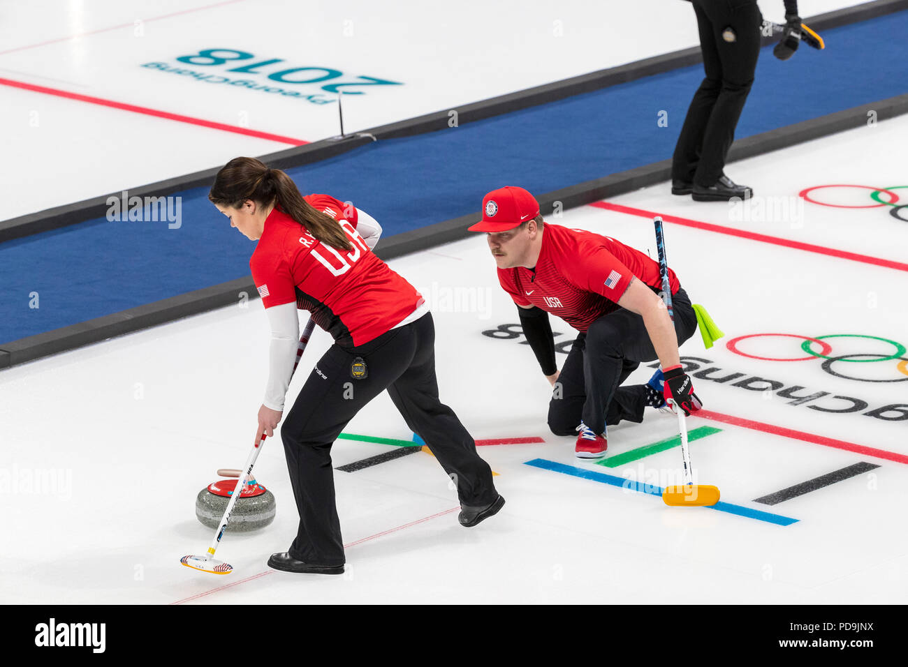 Matt and Rebecca Hamilton (USA) competing in the Mixed Doubles Curling ...