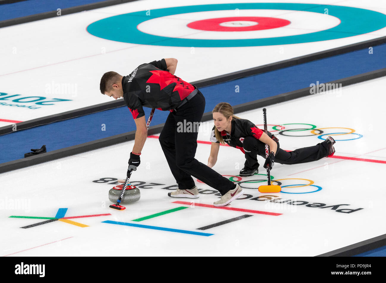 John Morris and Kaitlyn Lawes (CAN) competing in the Mixed Doubles ...