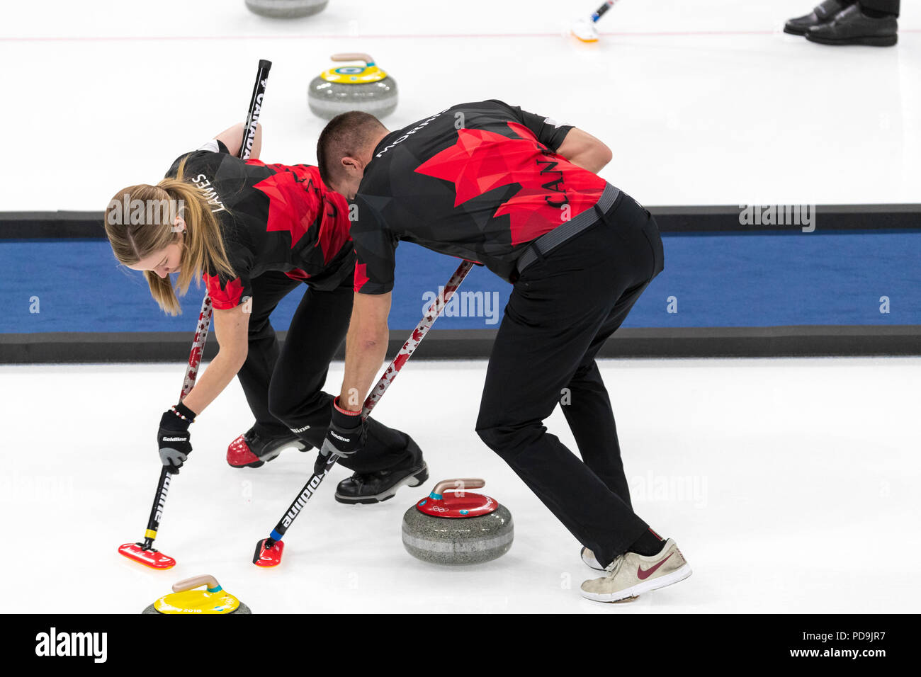 John Morris and Kaitlyn Lawes (CAN) competing in the Mixed Doubles ...