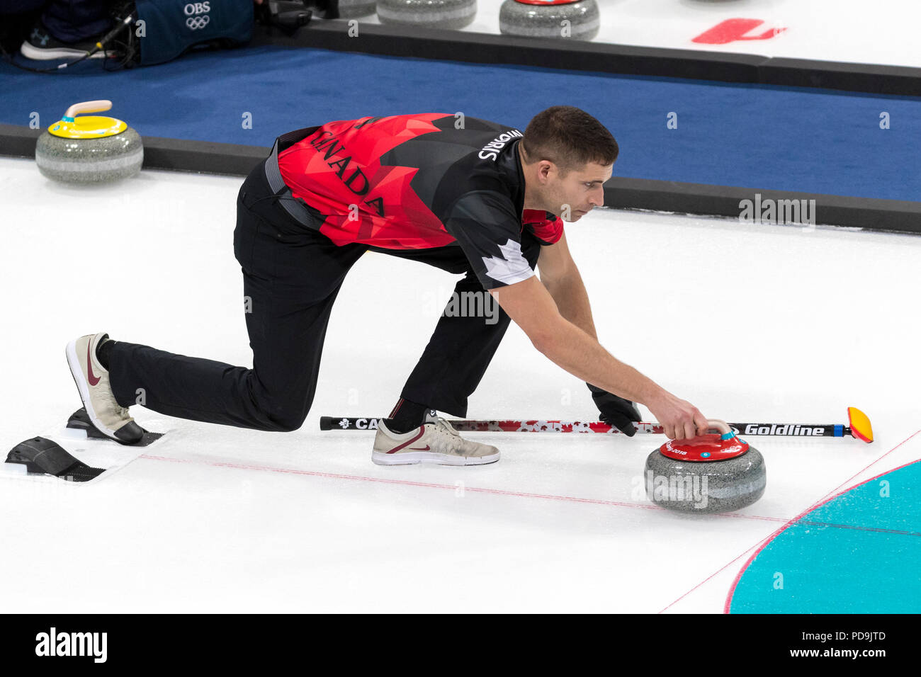John Morris (CAN) competing in the Mixed Doubles Curling round robin at ...