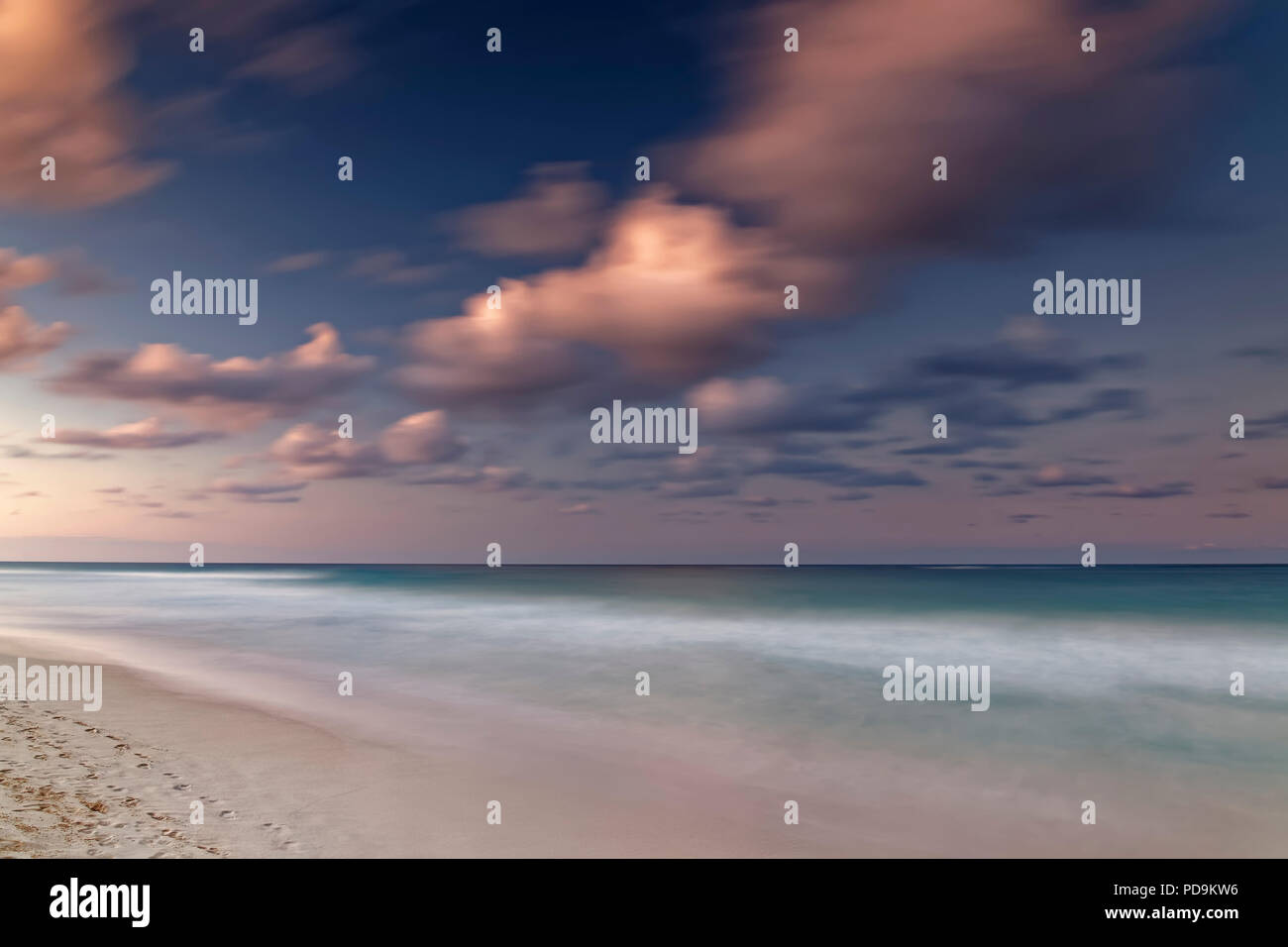 Afterglow with clouds by the sea, Playa Bavaro, Punta Cana, Dominican ...