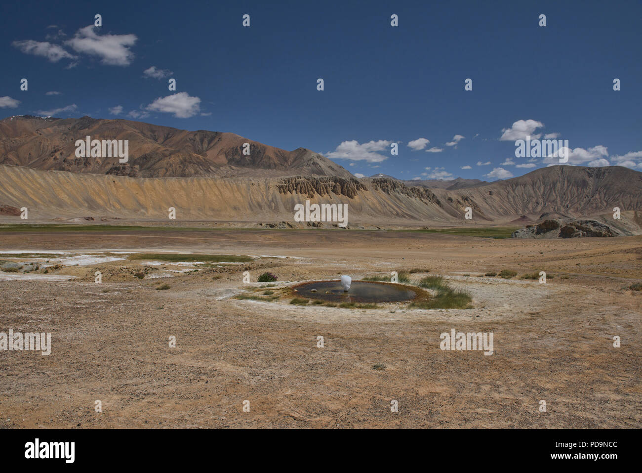 Geyser spouting near Lake Bulunkul, Tajikistan Stock Photo - Alamy