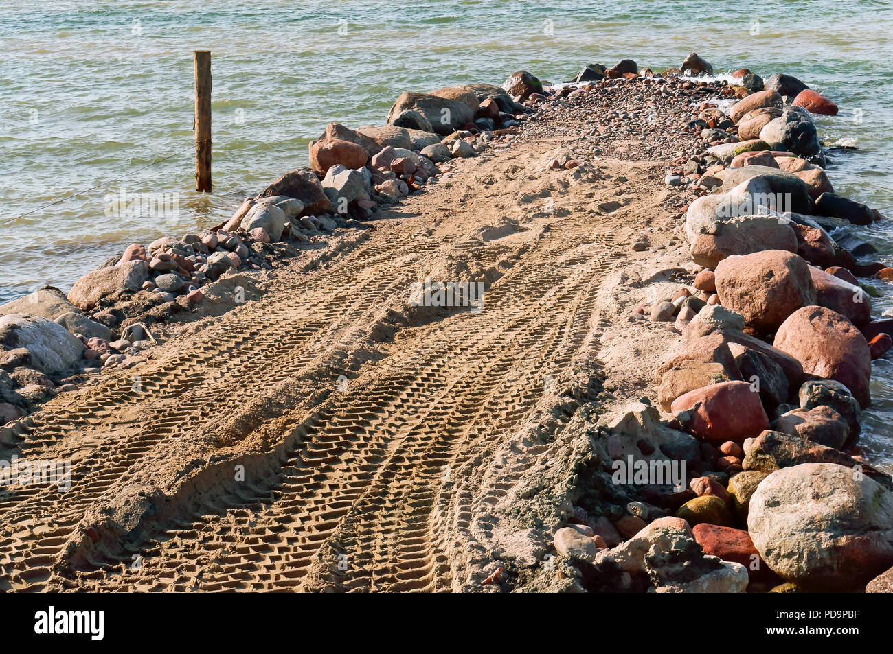 construction equipment on the shore, the construction of breakwaters ...