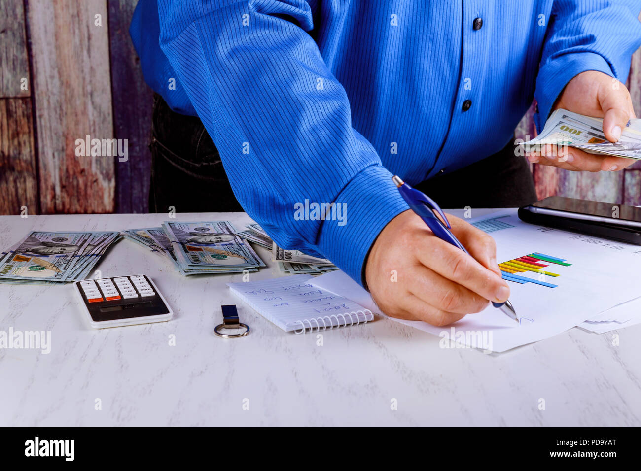Businessman hands saving counting U.S. dollar bills Stock Photo - Alamy