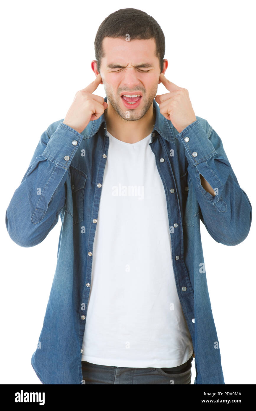 Covering his ears with hands ignoring hi-res stock photography and ...