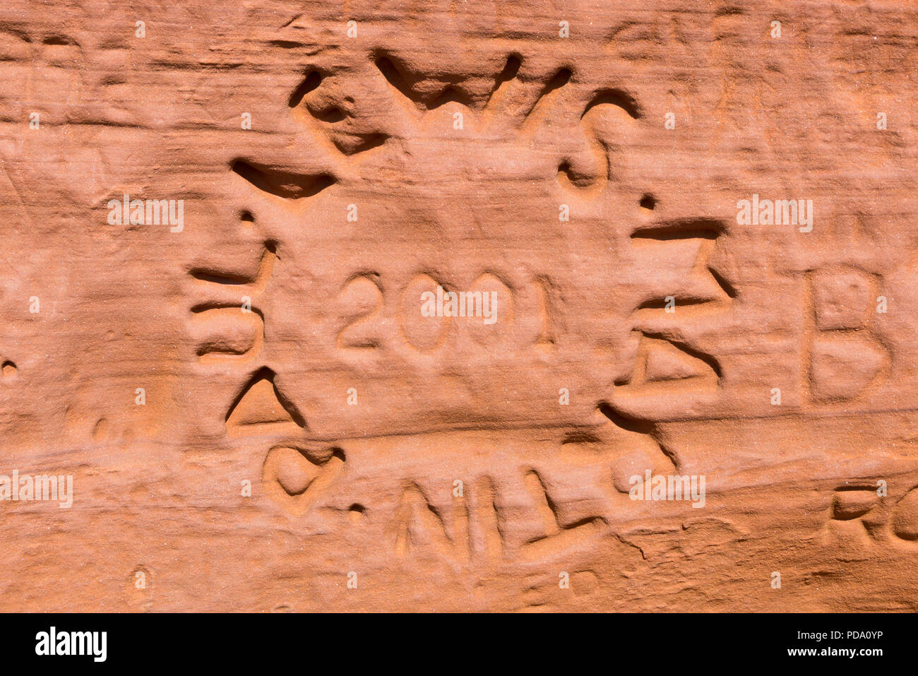 Graffti scratched into the cliffs of the Jurassic Coast below Jacobs ...
