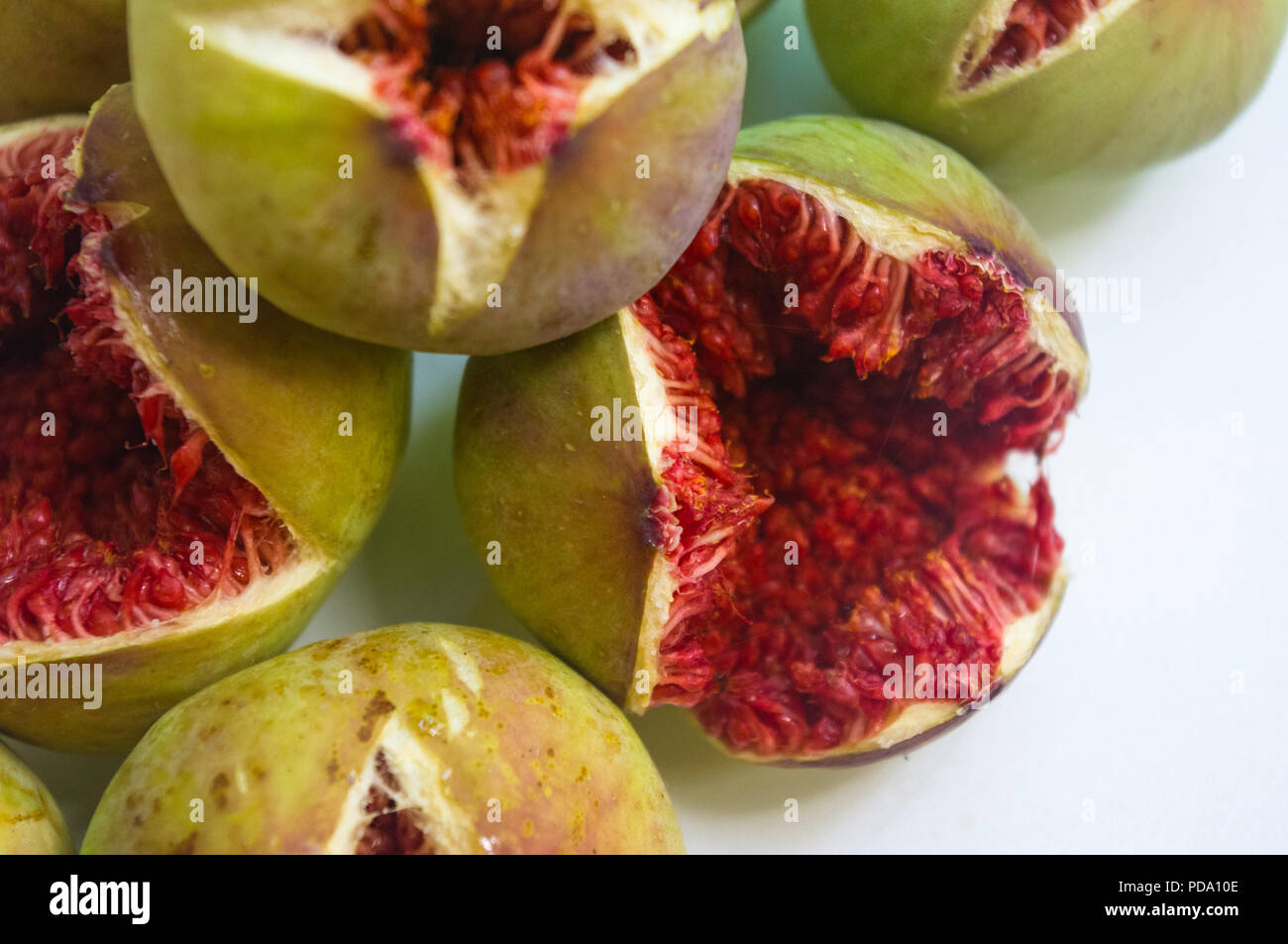Ripe colorful sweet figs fruit on a plate, close up Stock Photo - Alamy