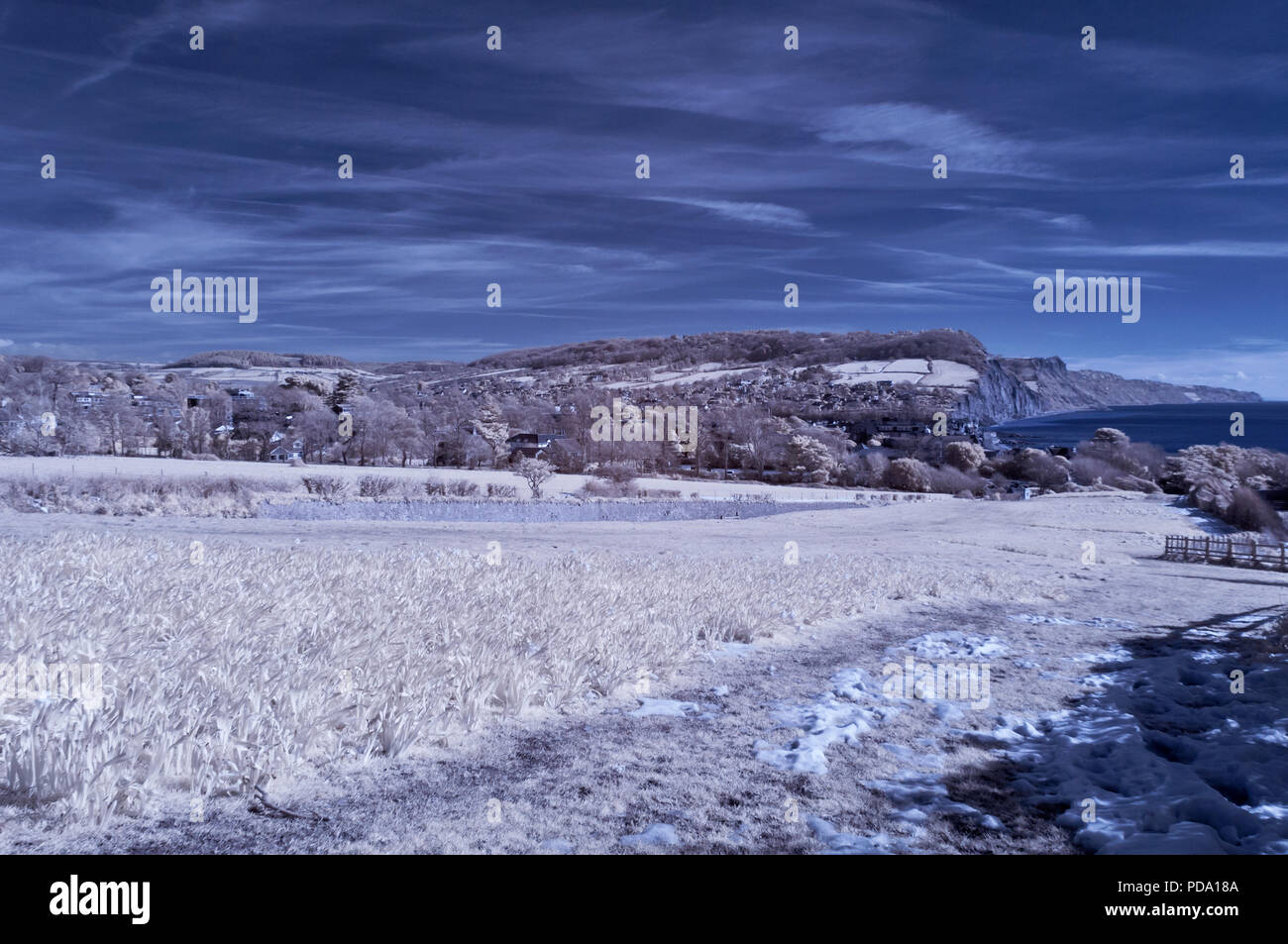 Infrared scenic view along the Jurassic Coast of Lyme Bay looking ...