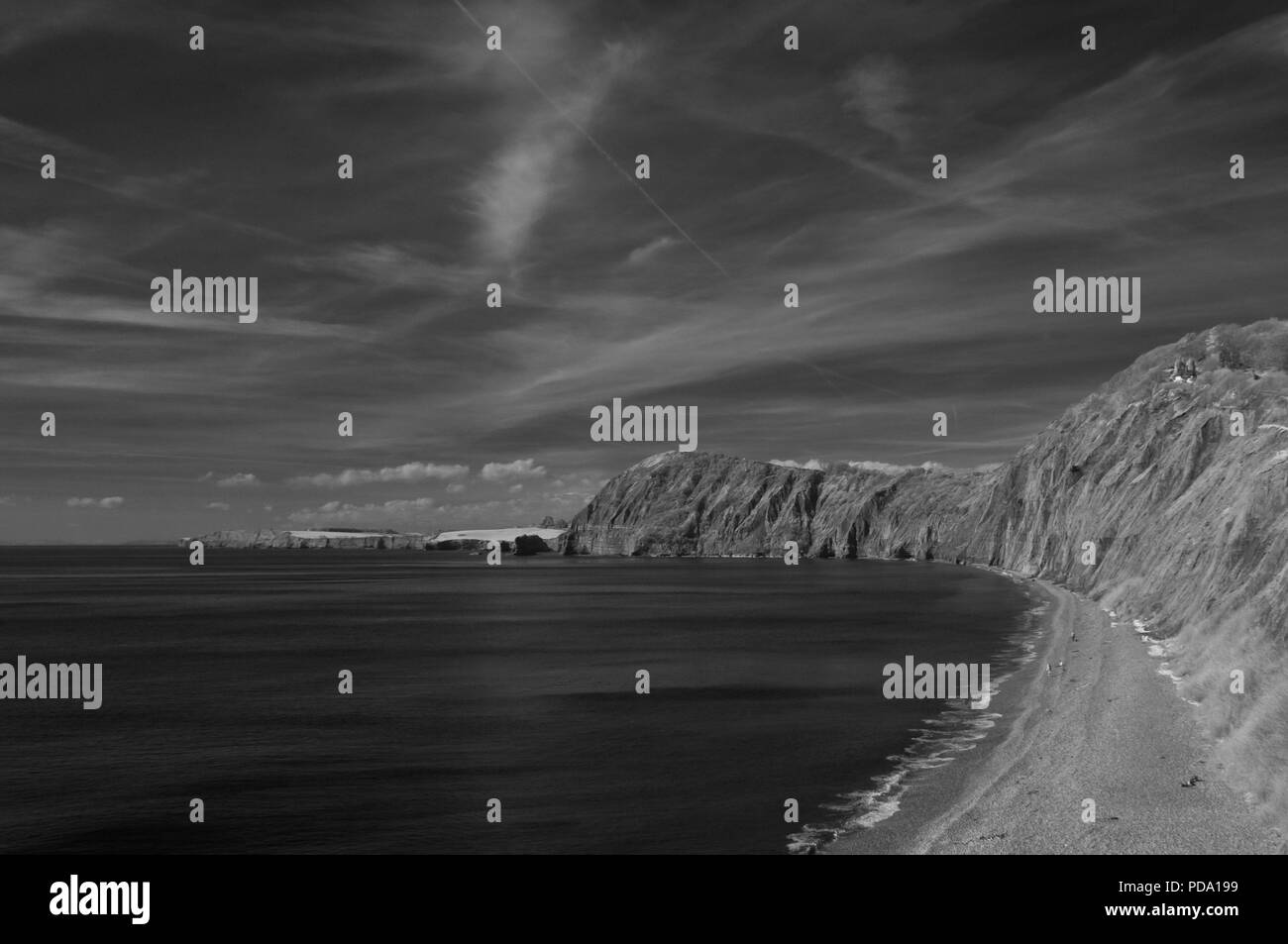 Infrared scenic view along the Jurassic Coast of Lyme Bay looking ...