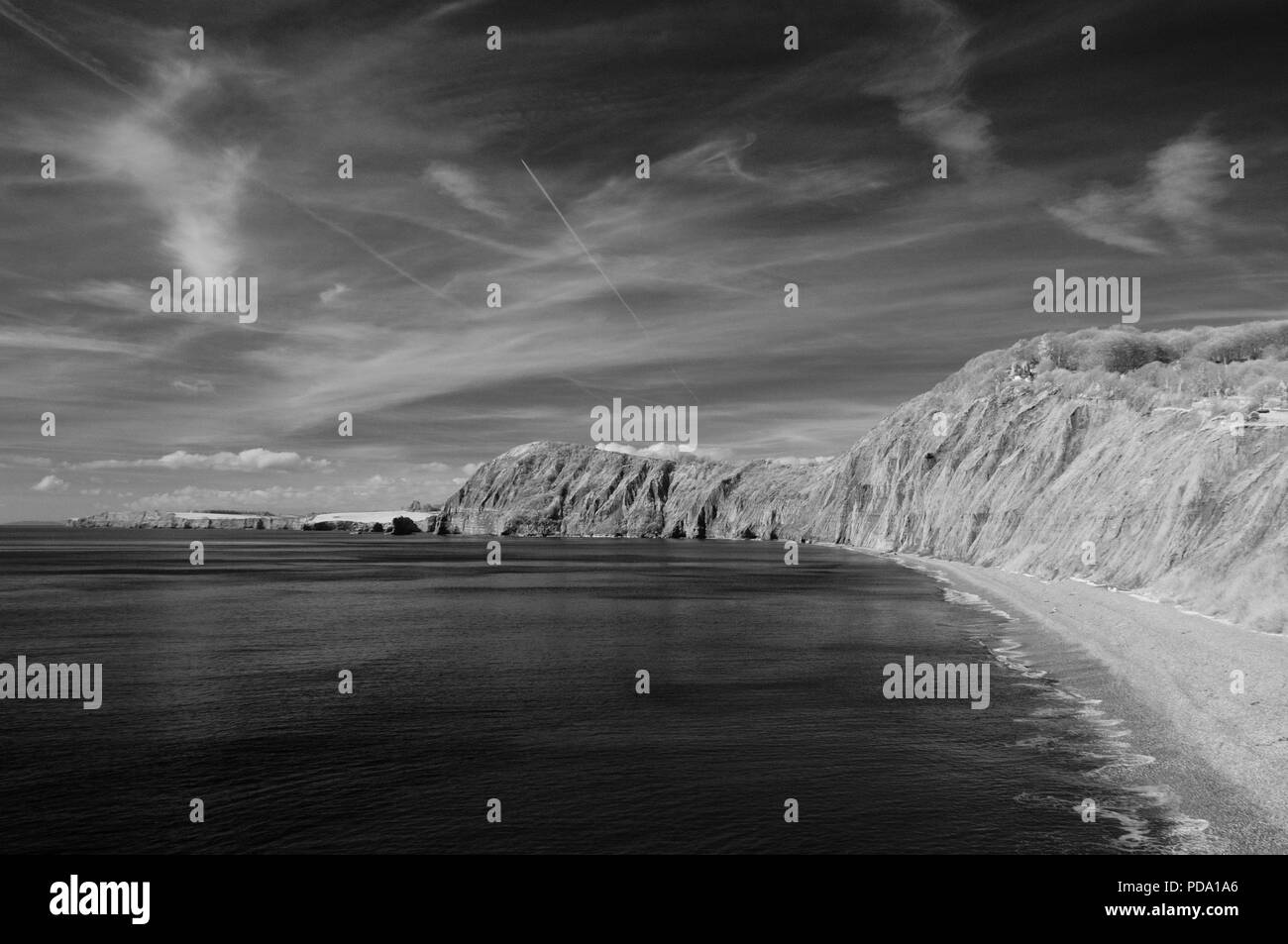 Infrared scenic view along the Jurassic Coast of Lyme Bay looking ...