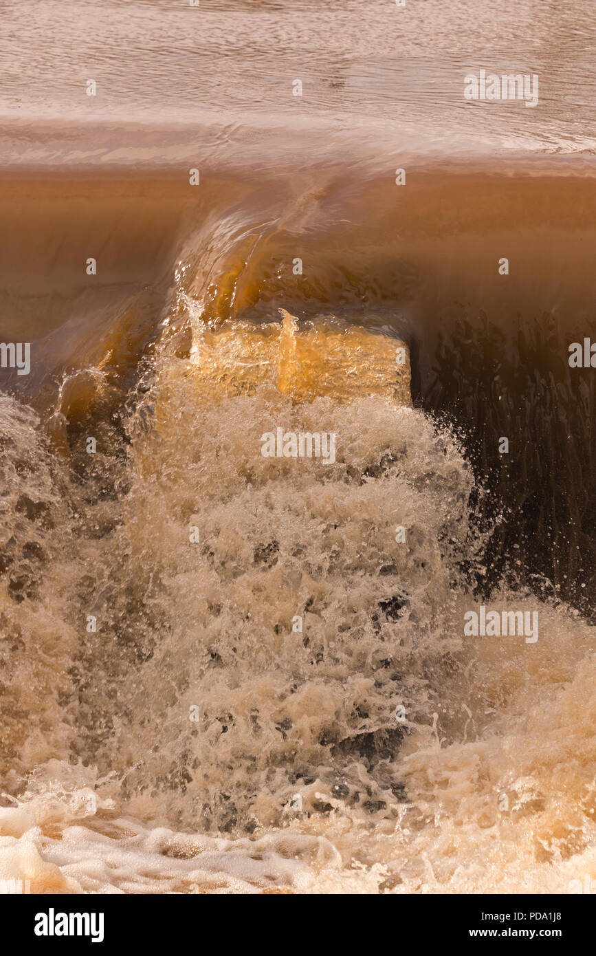 The river Tone in spate at French Weir on the River Tone in the centre ...