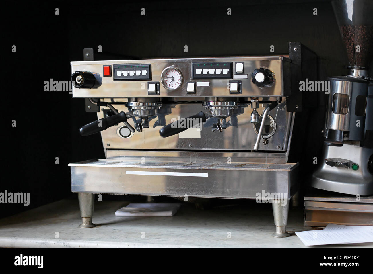 Espresso Coffee Machine and grinder in cafe bar Stock Photo - Alamy