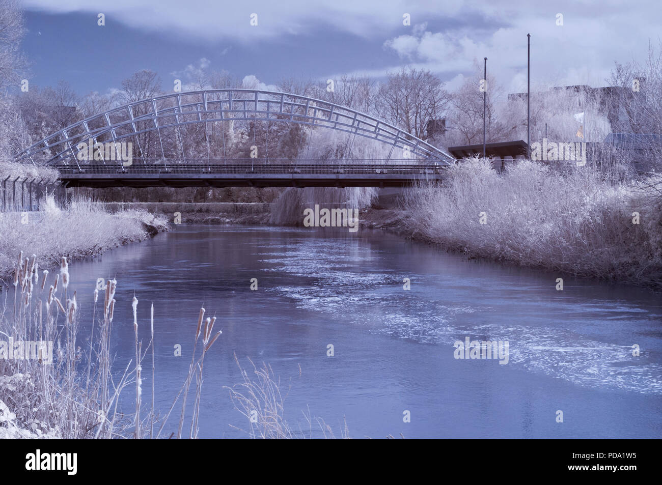 Scenic infrared picture of New Bridge on the River Tone in the centre ...