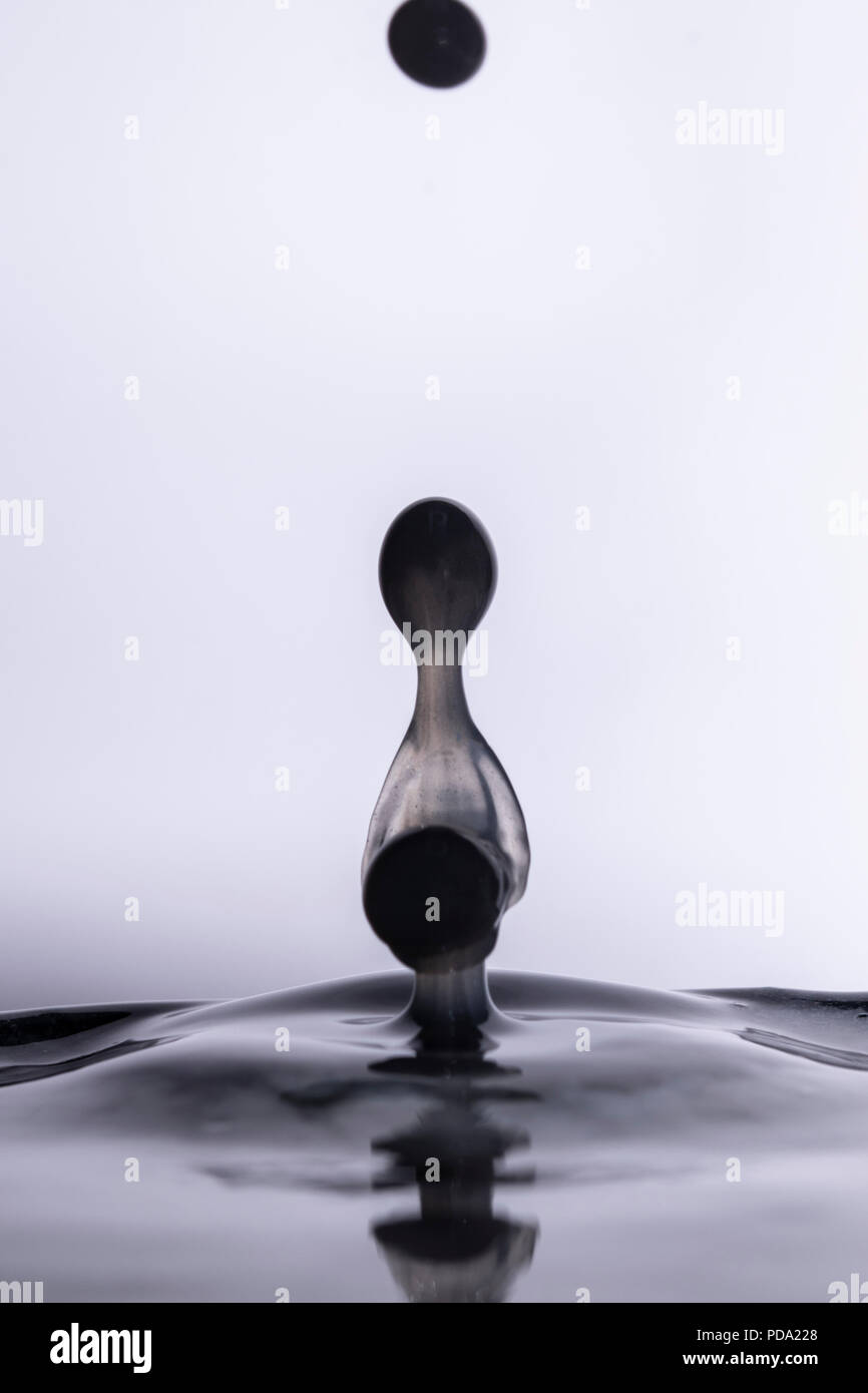Waterdrop photography creating splash art Stock Photo - Alamy
