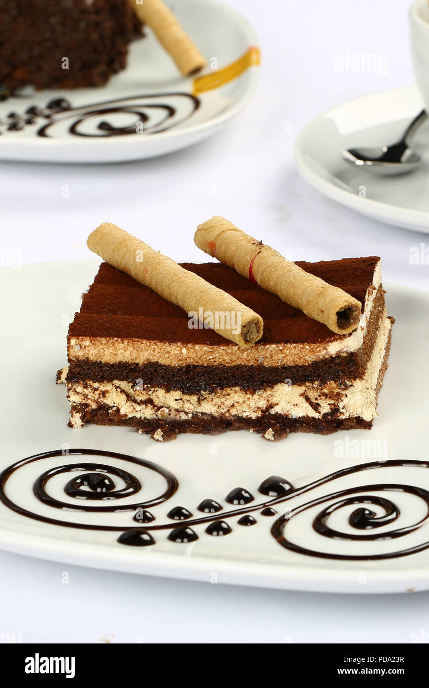 Tiramisu cake on plate Stock Photo - Alamy