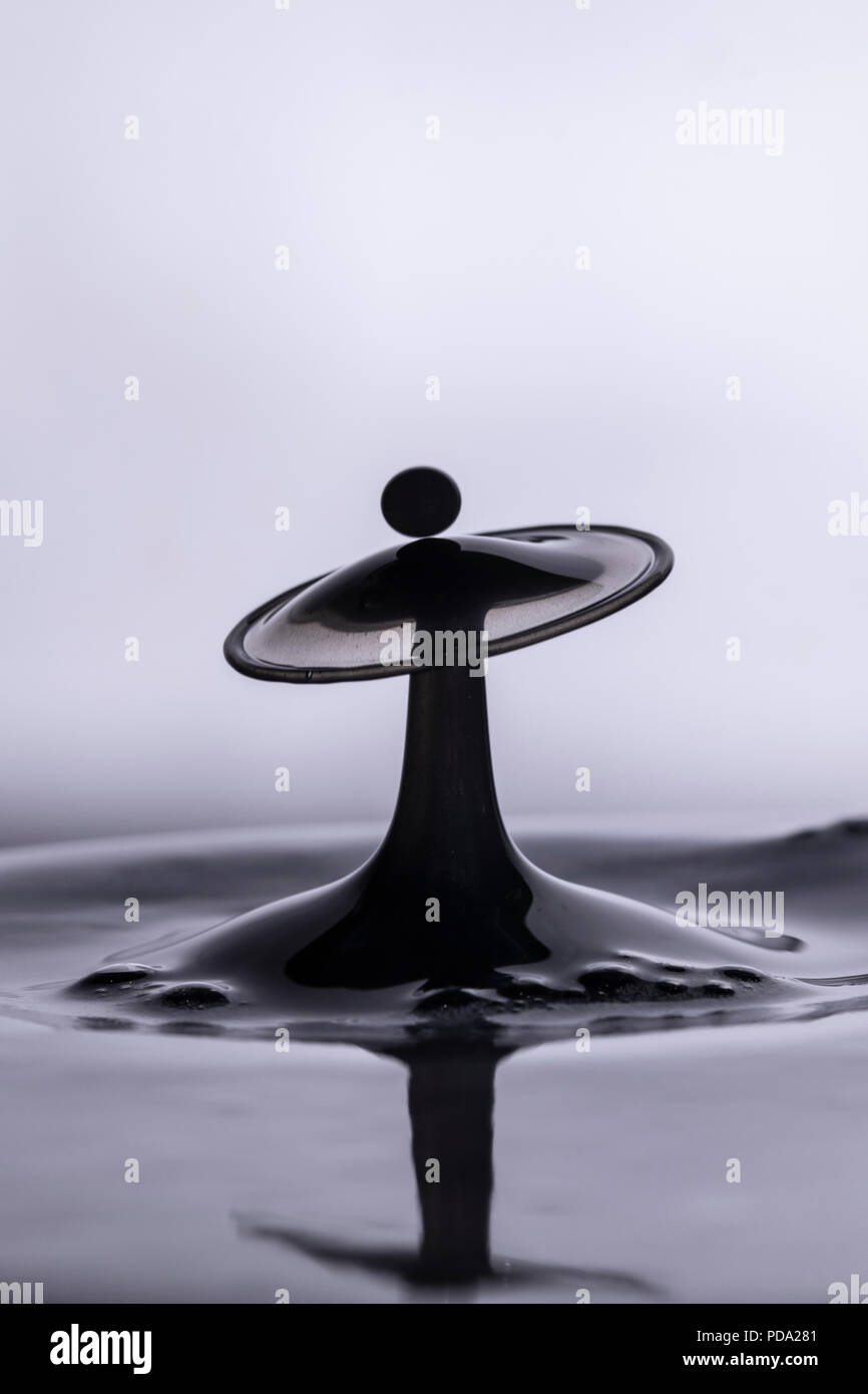 Waterdrop photography creating splash art Stock Photo - Alamy