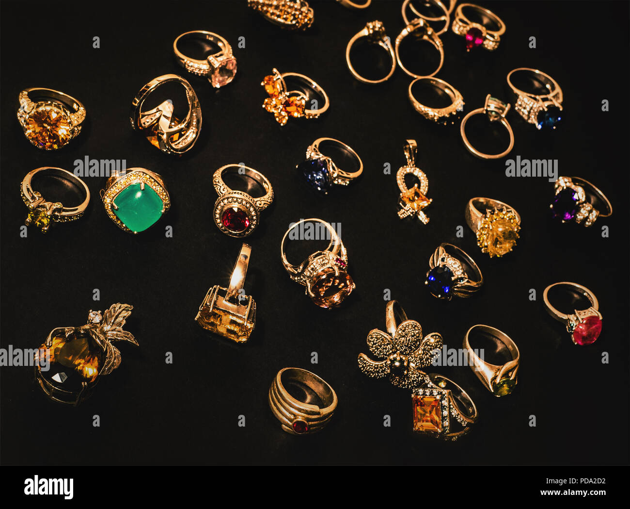 many golden finger-rings Stock Photo - Alamy