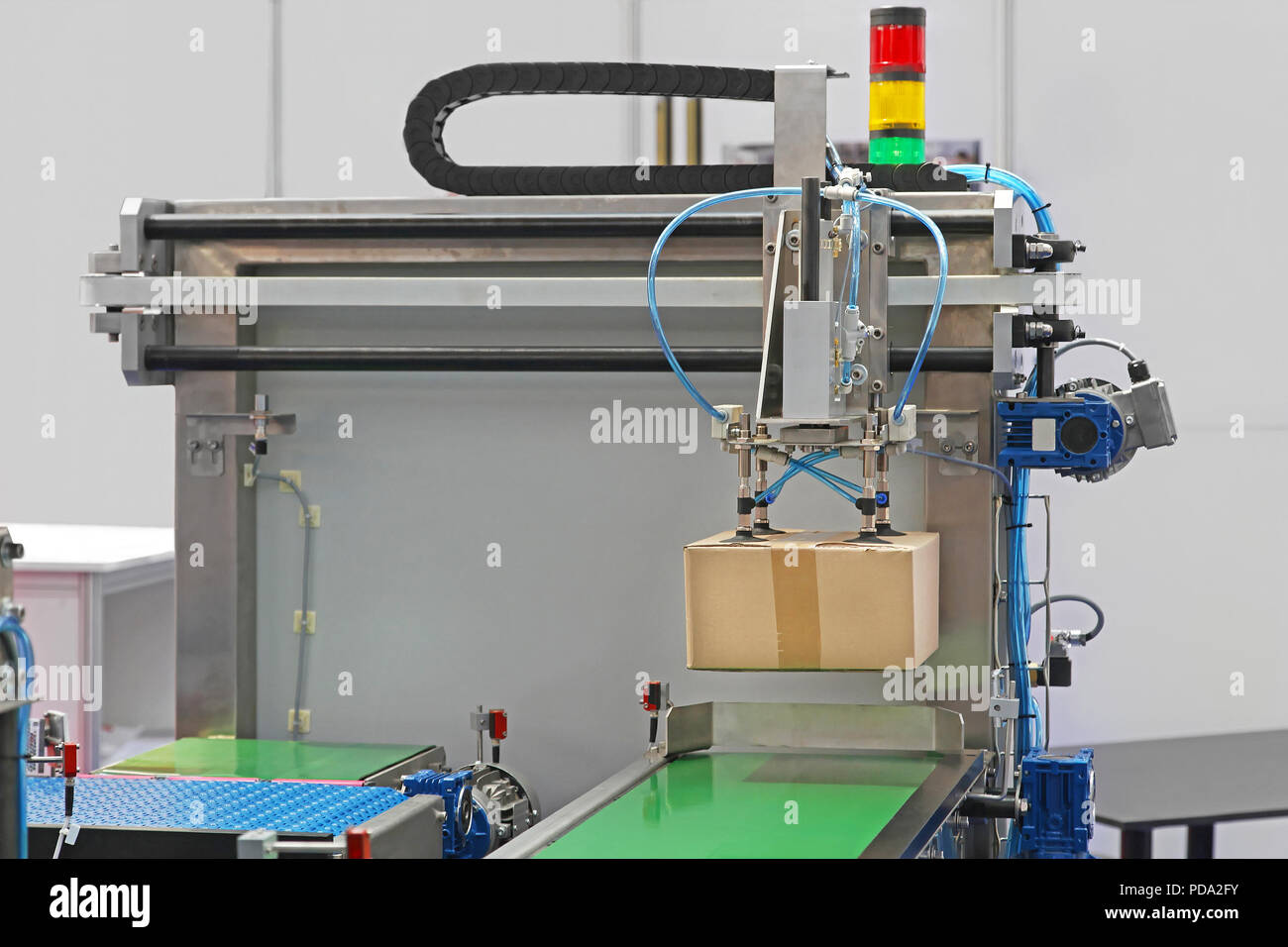 Handling packages at automated line in distribution warehouse Stock ...
