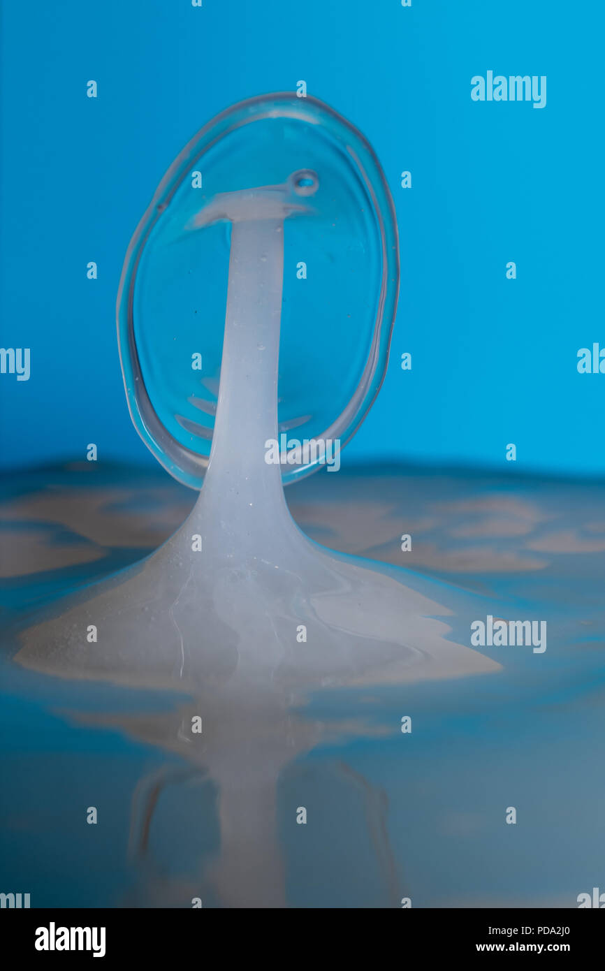 Waterdrop photography creating splash art Stock Photo - Alamy