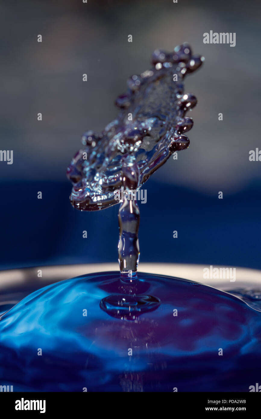 Waterdrop photography creating splash art Stock Photo - Alamy