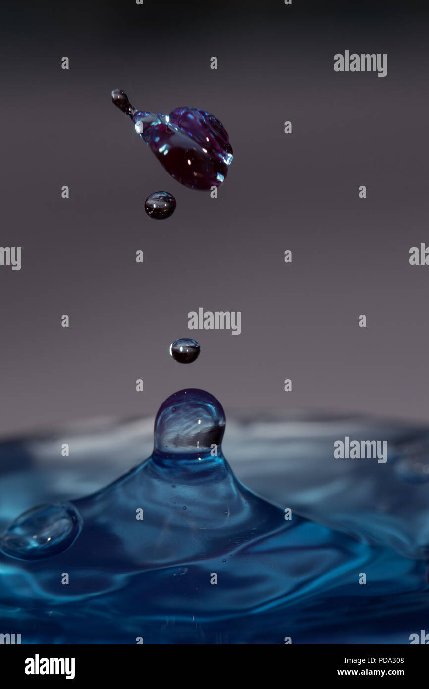 Waterdrop photography creating splash art Stock Photo - Alamy