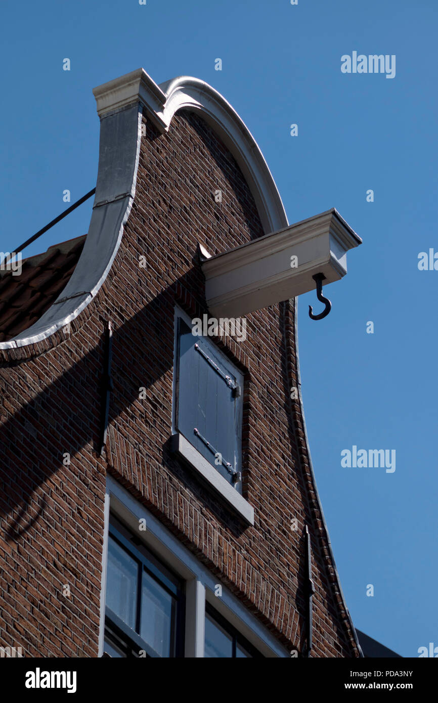 Typical Dutch gabled roof houses with hooks formerly used for elevating ...